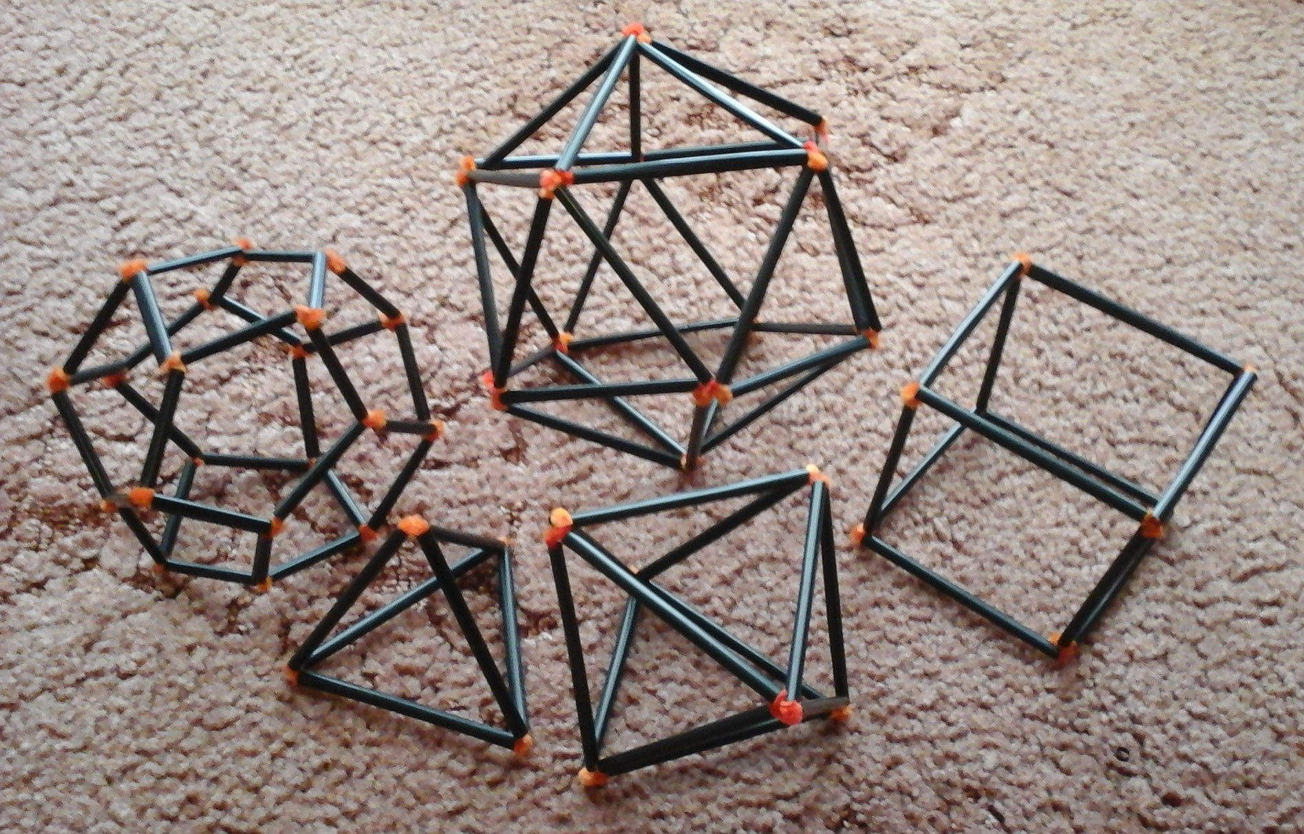 Building some Platonic Solids to take home at the Curious Minds Club ...